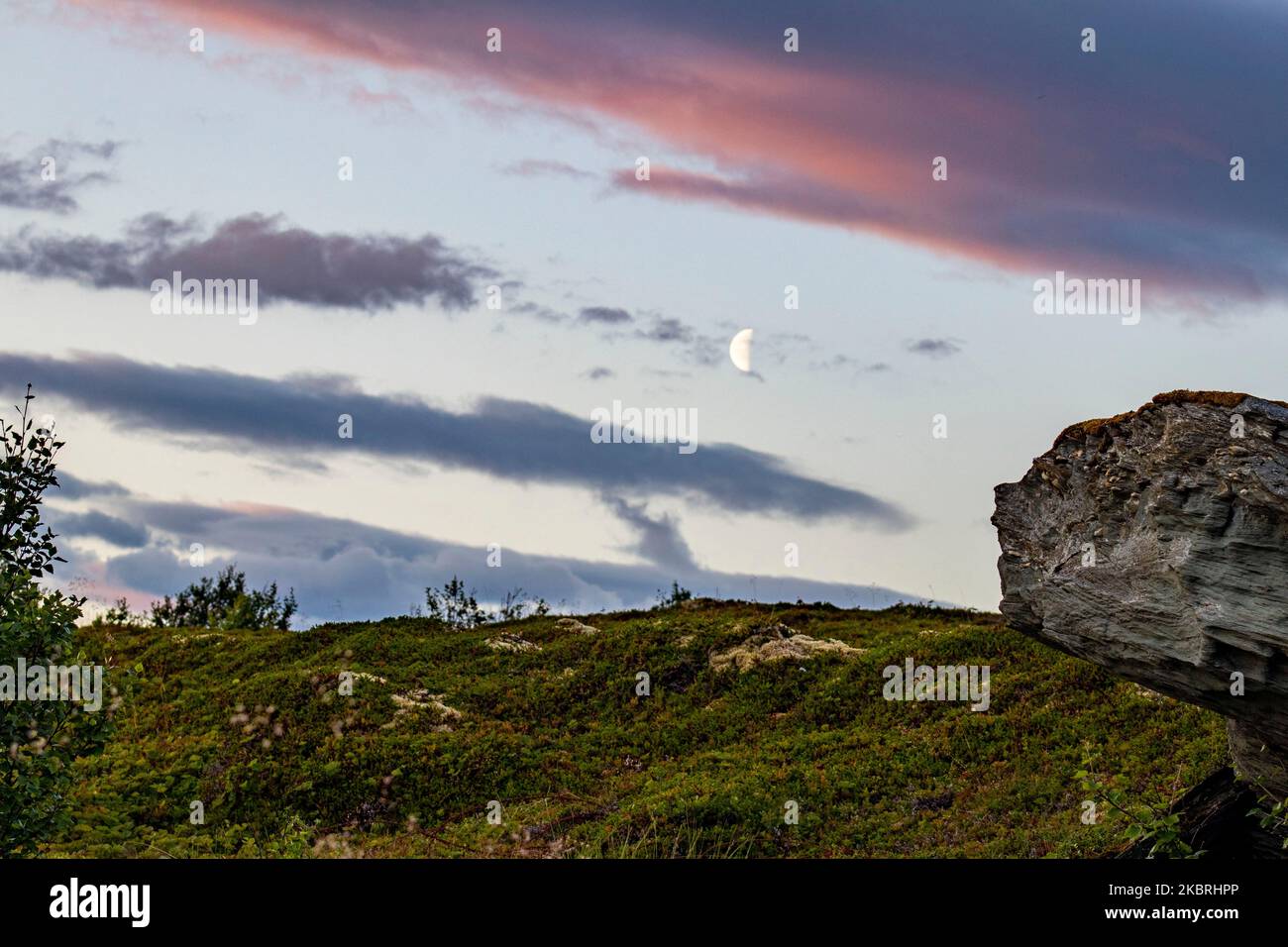 Large stone in Norway on the background of the sky with the moon Stock ...