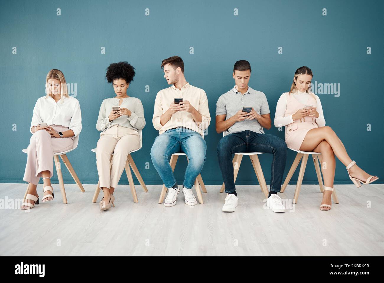 Business people, waiting room and smartphone for job search engine ...