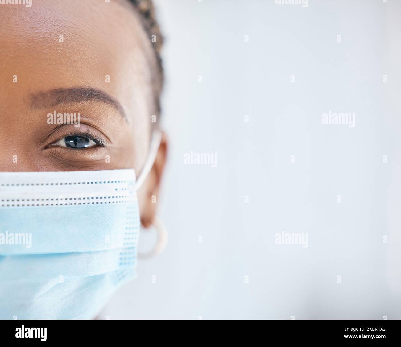 Covid, face mask and portrait of doctor working in hospital with safety ...
