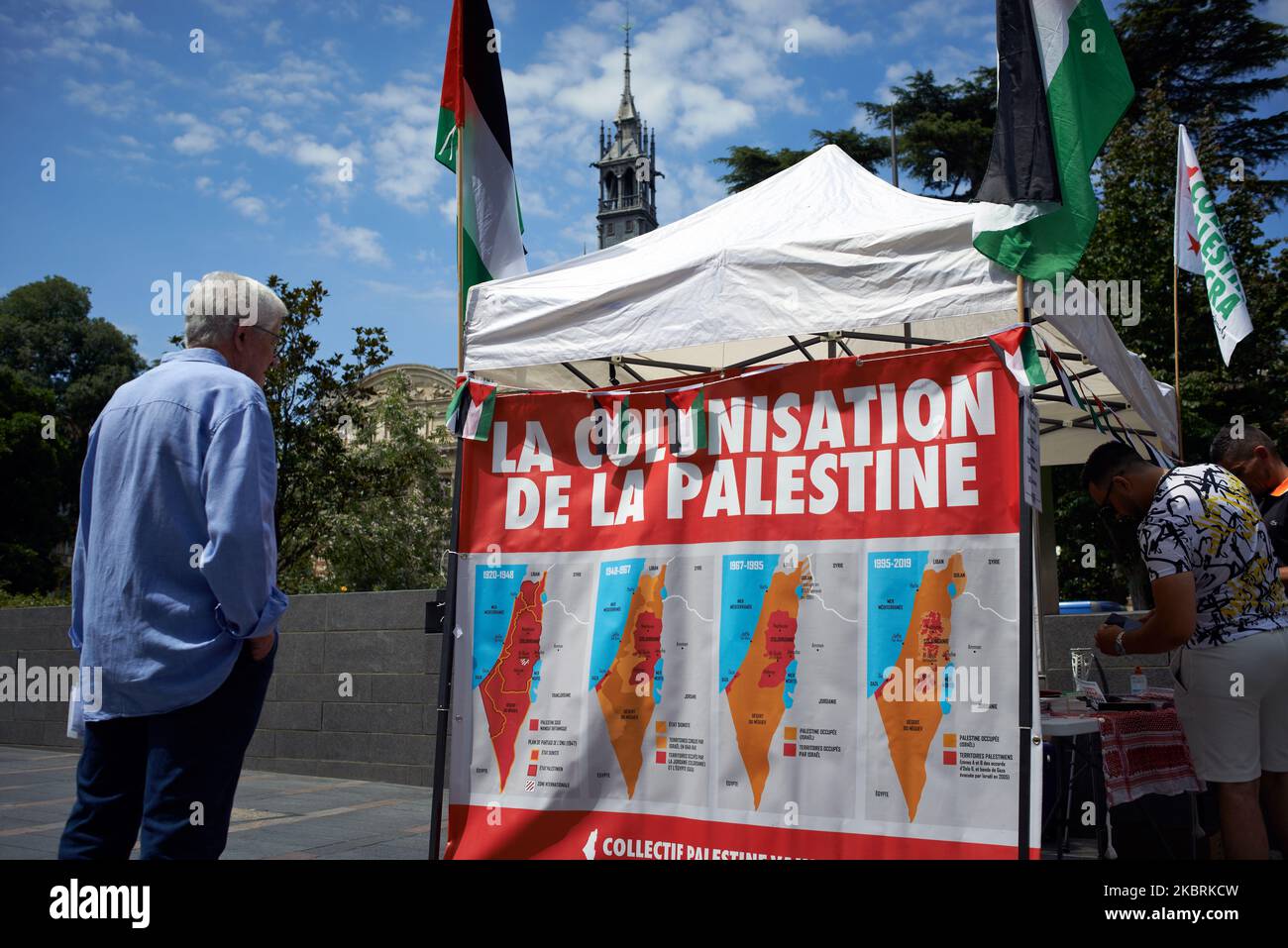 A passer-by looks at a Palestine's map from 1948 (creation of the state ...