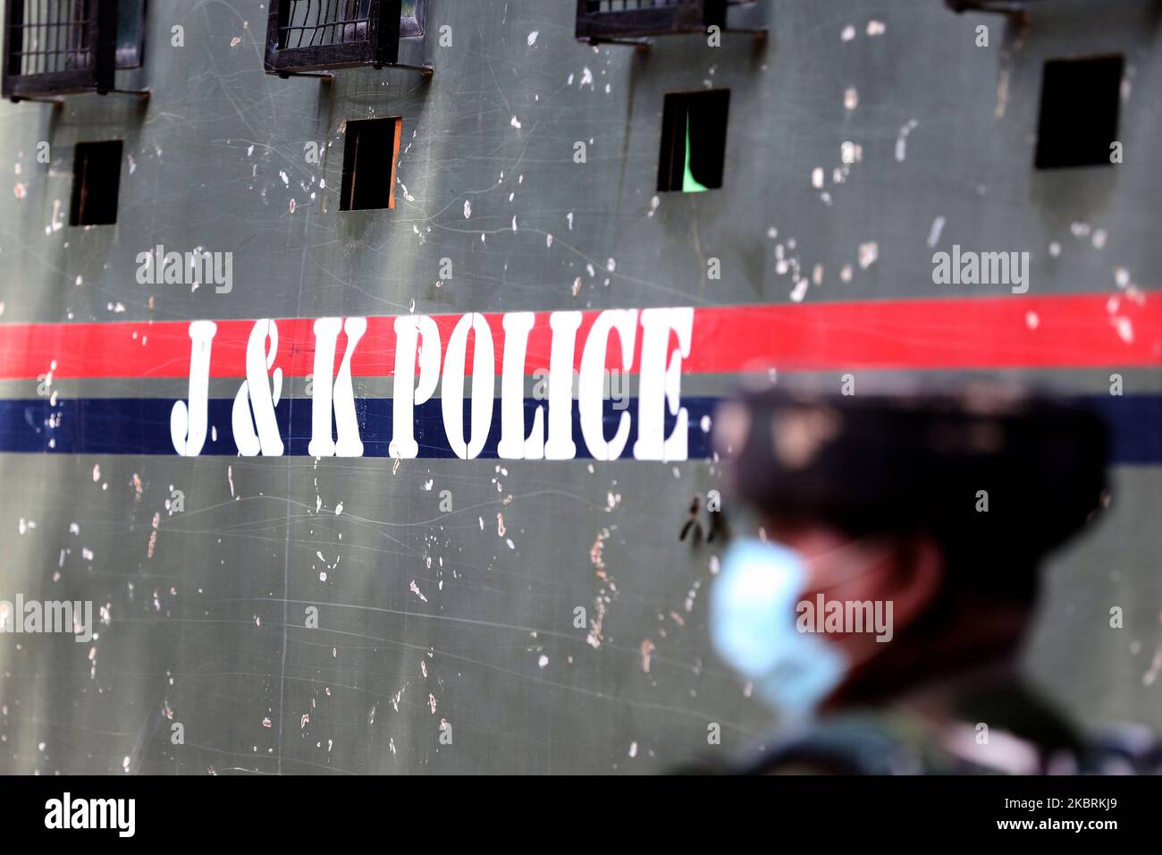 A Jammu and Kashmir (JKP) cop takes position during an encounter in ...