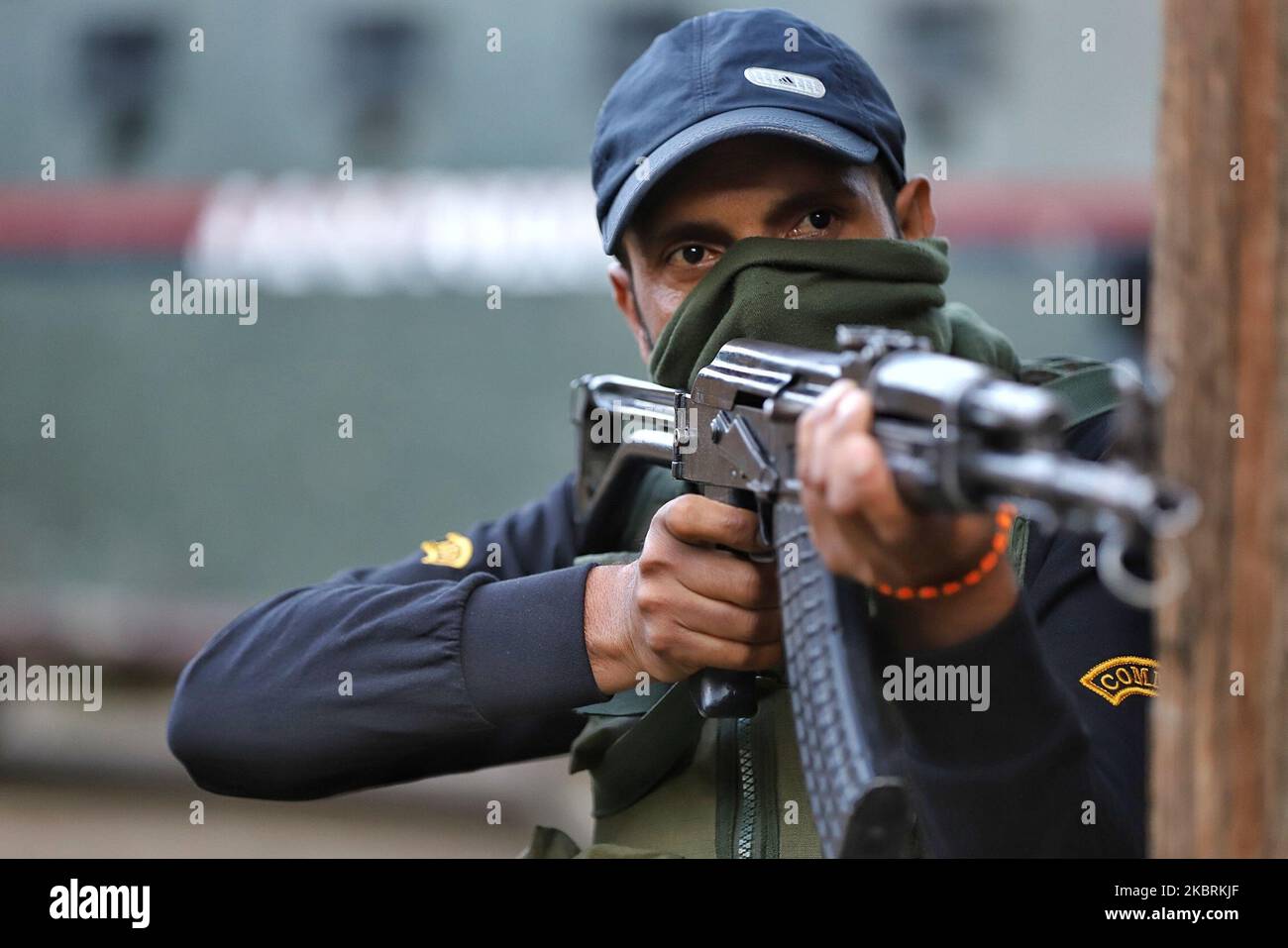 A Jammu and Kashmir (JKP) cop takes position during an encounter in ...