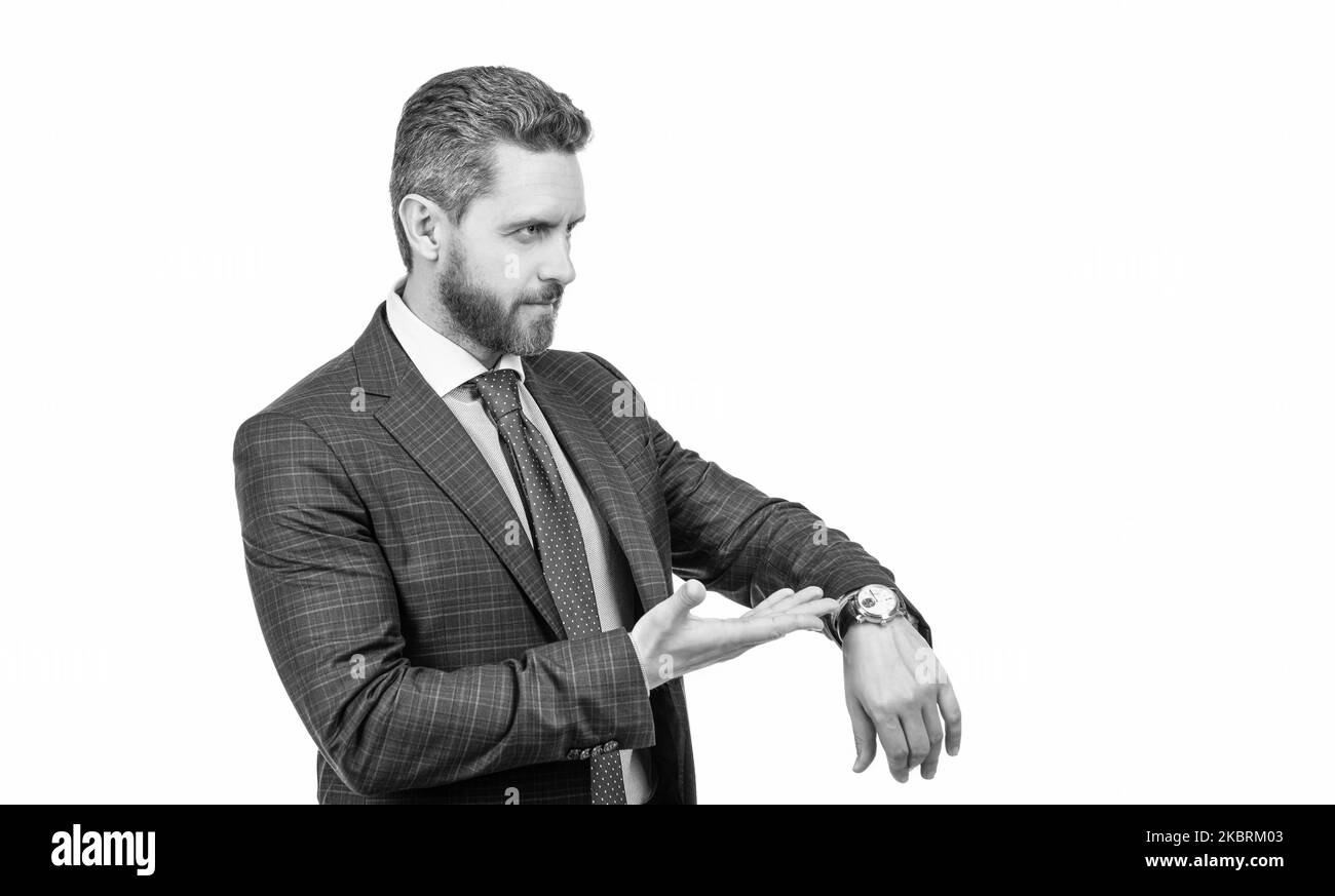 Watch is a new style. Senior manager point finger at wrist watch. Time ...