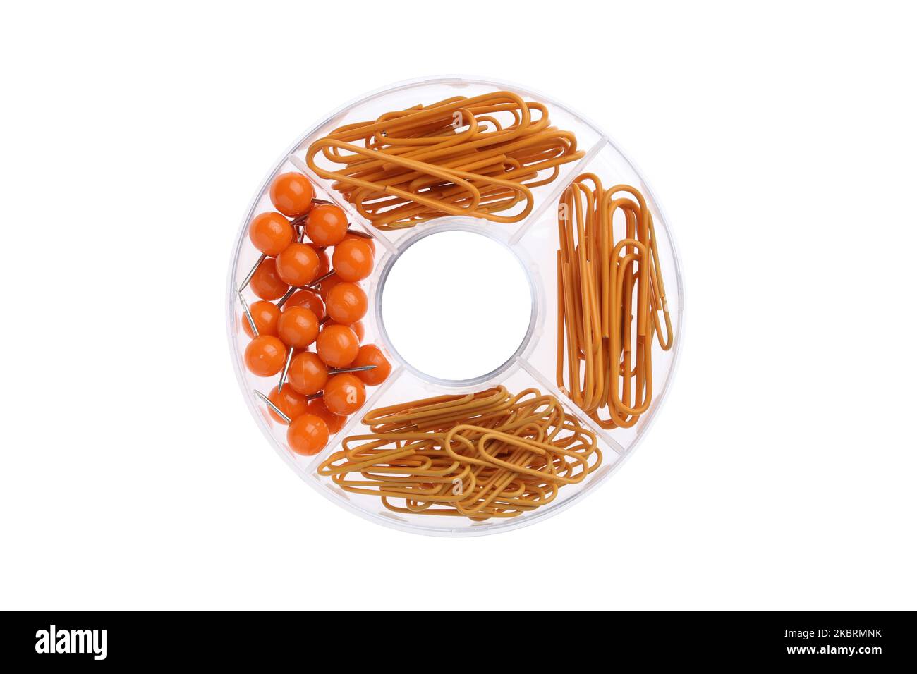 Paper clip dispenser, orange color pins and clips collection. Office ...