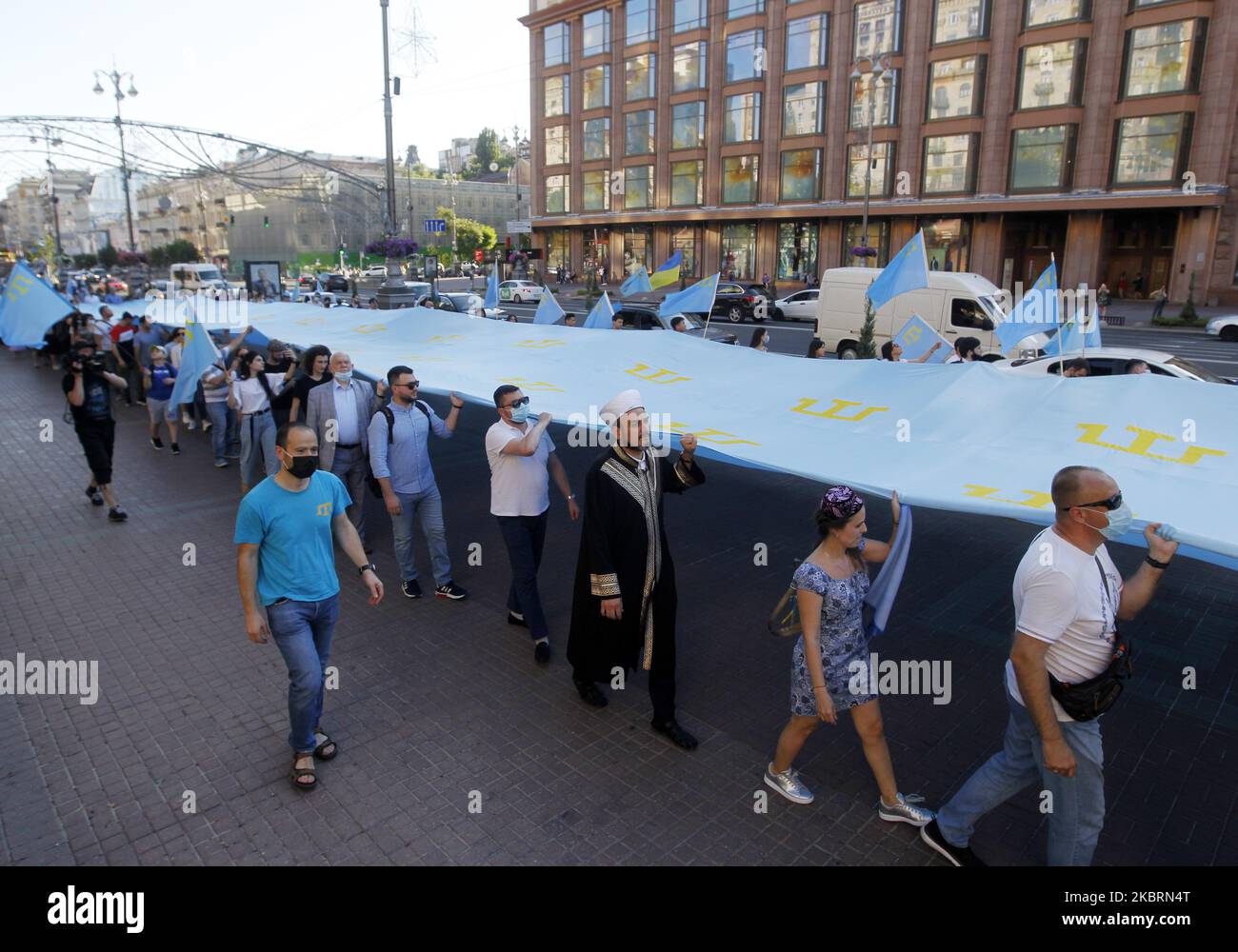 Crimean Tatars community in Ukraine carries a giant Crimean Tatar flag ...