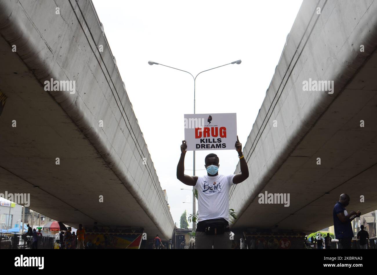 Male volunteer hold placard hi-res stock photography and images - Alamy