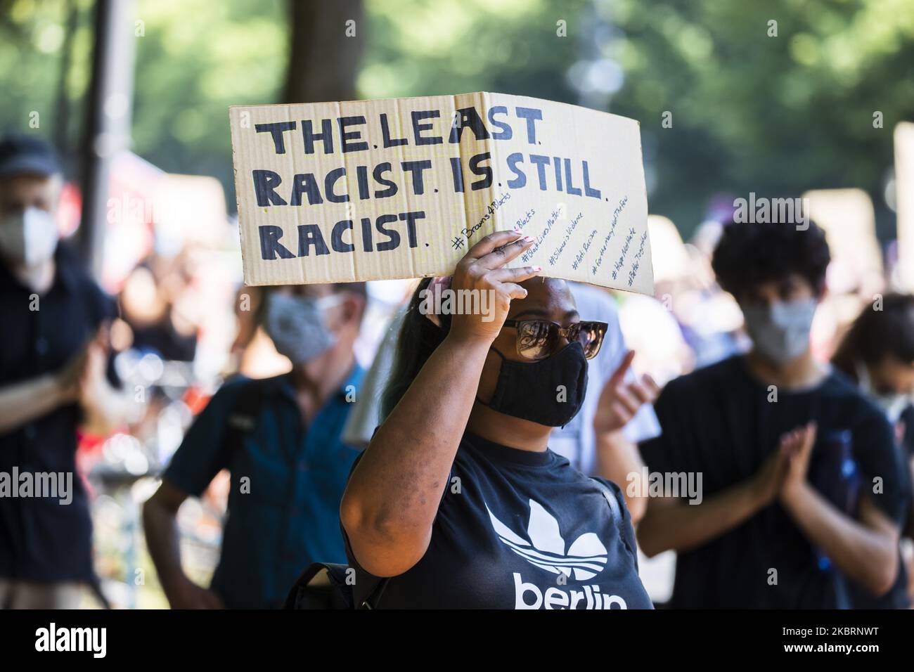 People protest against racism and for racial equality and pay tribute ...