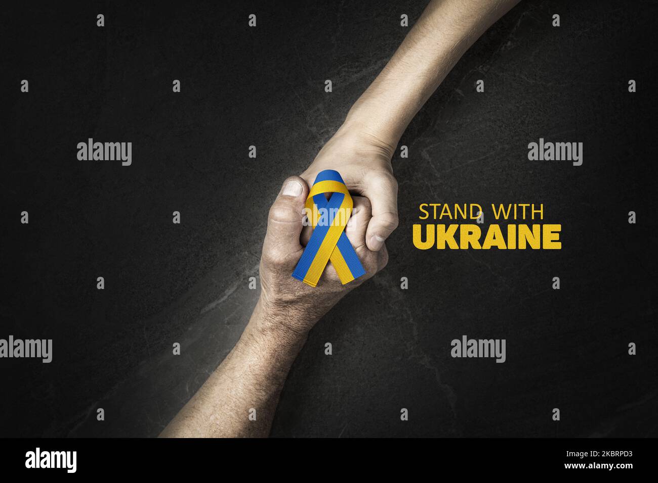 adult hand holds childs hand Stock Photo - Alamy