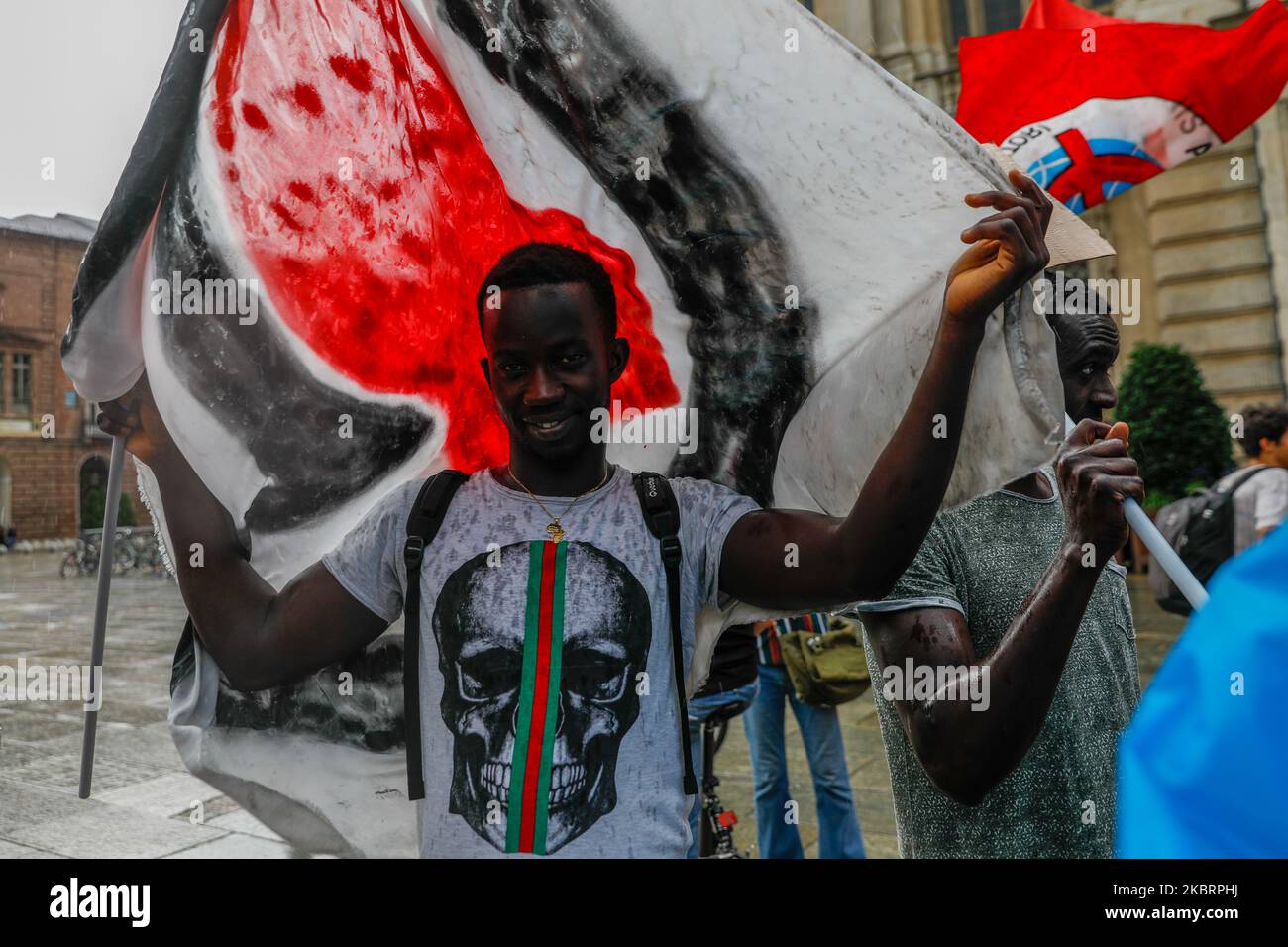 Turin, Italy 27th June 2020. Hundreds of demonstrators march to support ...