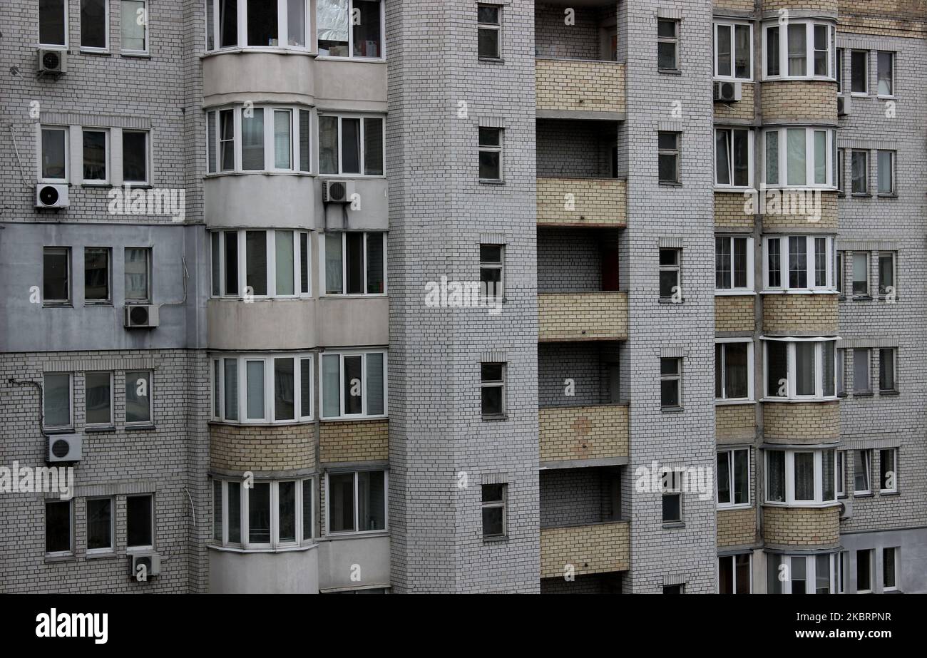 Multi storey modern apartments behind a high-rise building made of old ...