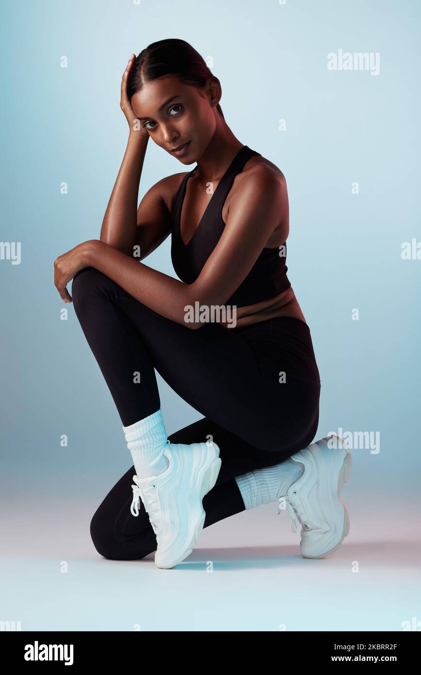 Fitness, health and sports model in a studio with sportswear for ...