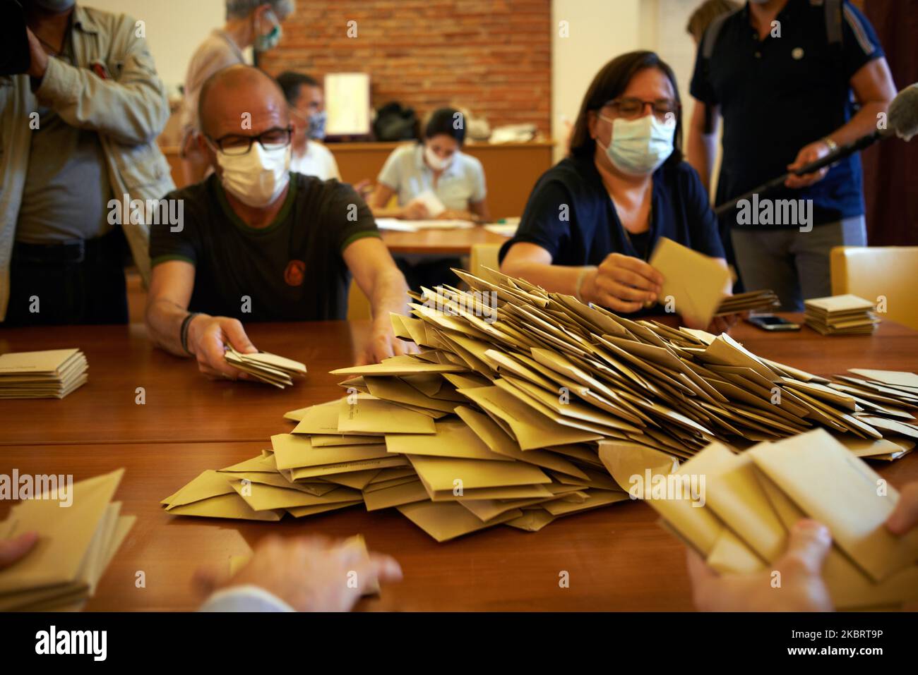 Assessors prepare to count the ballot papers. Antoine Maurice, leader ...