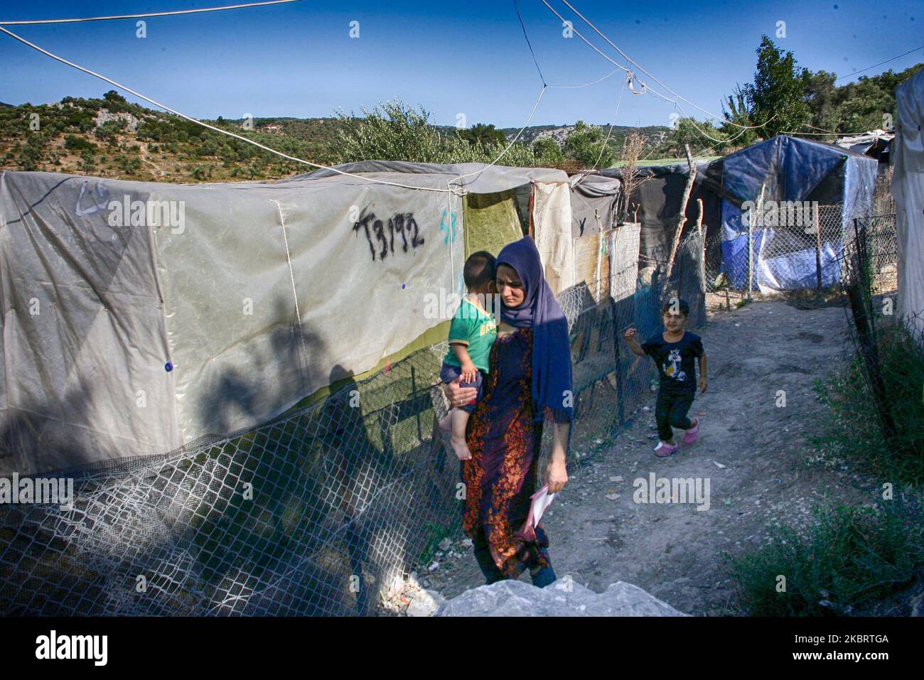 Asylum seekers pictured in Moria Camp in Lesbos Island, as they ...