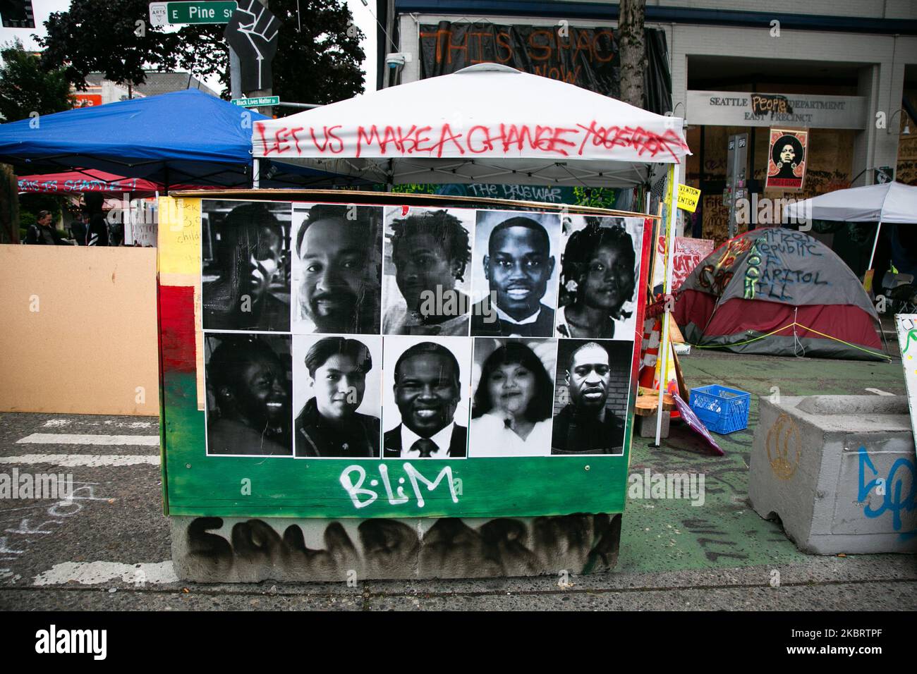 Tents and sign in the area known as the Capitol Hill Organized Protest ...