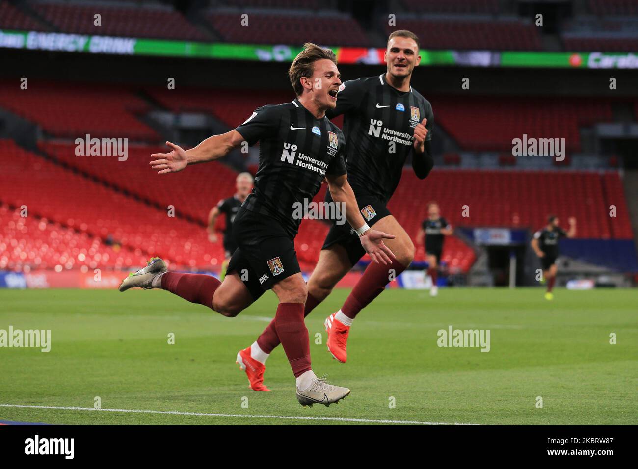 Sam Hoskins of Northampton Town celebrates scoring his sides third goal ...