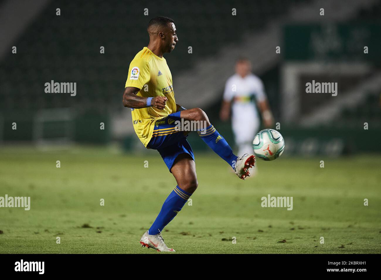 Carlos Akapo of Cadiz does passed during the La Liga Smartbank match ...