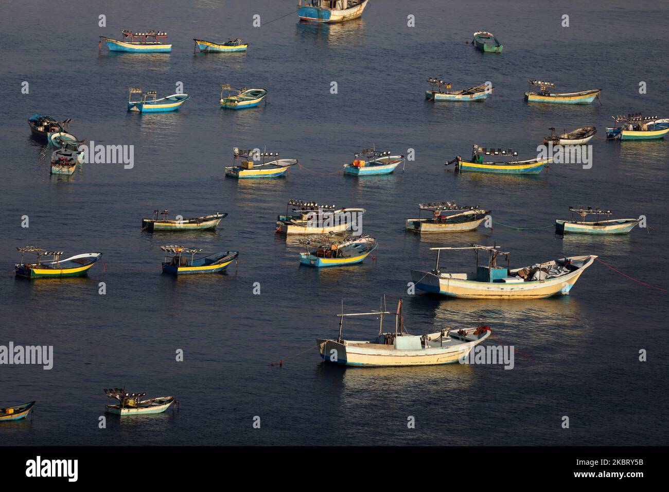 Palestinian fishing boats are seen at the main port in Gaza city on ...