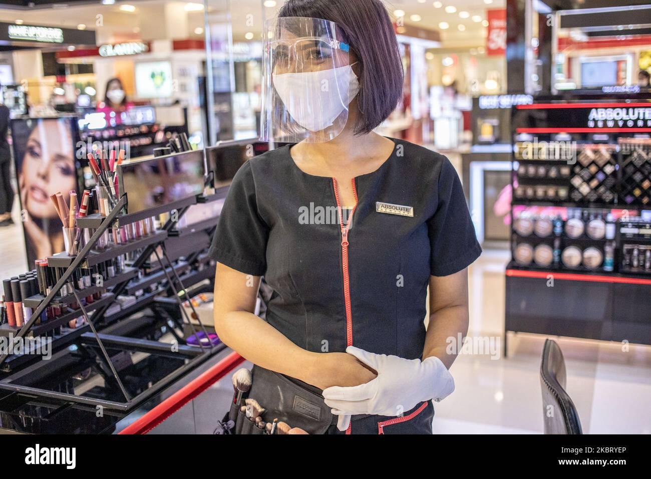 Beautician at the Mall with her mask and face shield in Jakarta ...