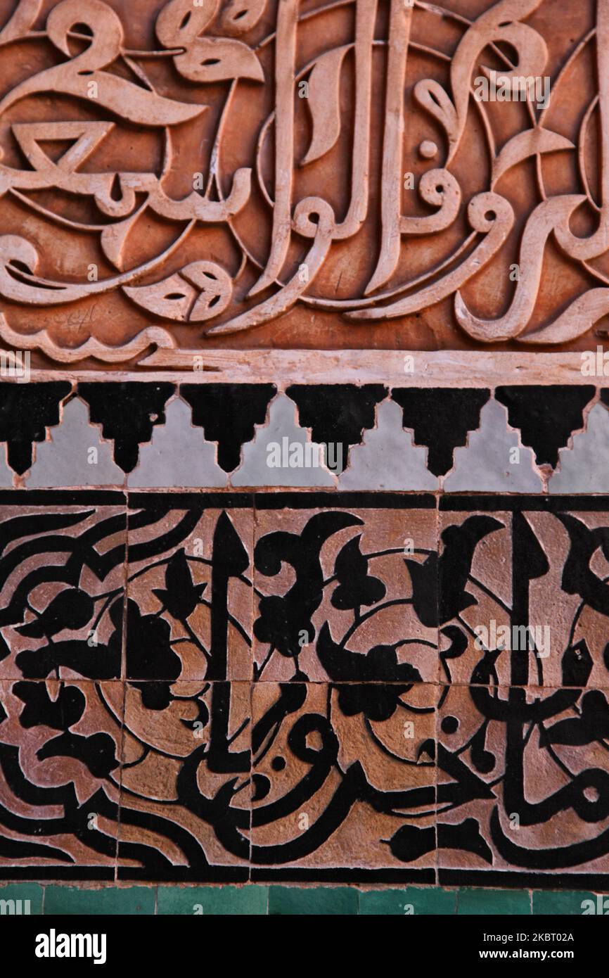 Detail of the ornate mosaic tile work and Islamic calligraphy adorning ...