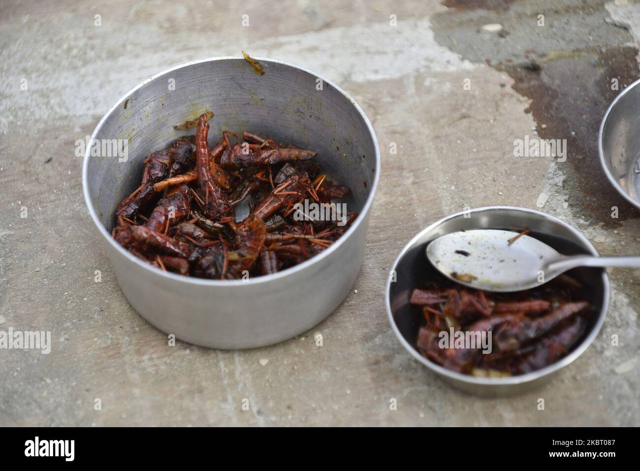Nepalese people eating locust hi-res stock photography and images - Alamy