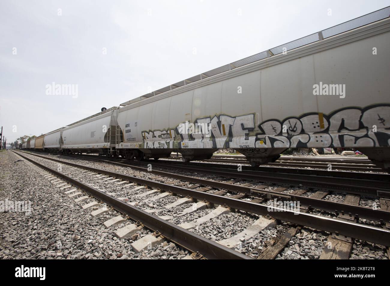 Central American migrants wait for the train called ''La bestia'' ( The ...