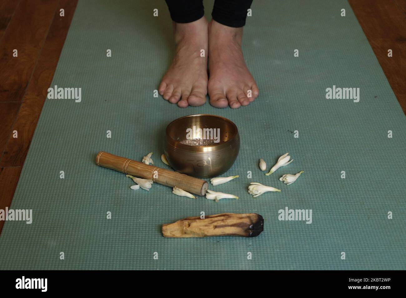 Ana López, yogi and urban planner, performing a ritual with a Tibetan ...