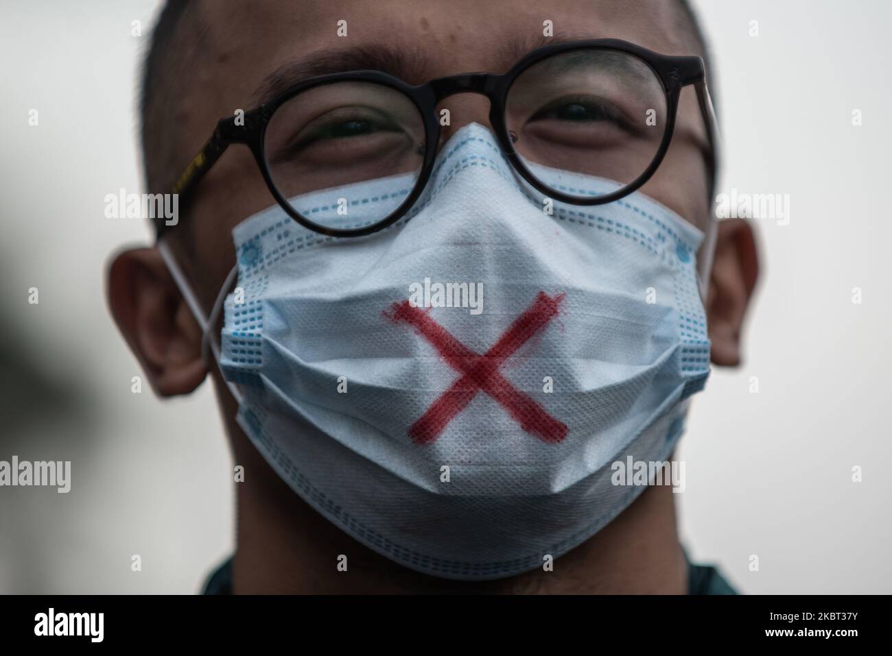 A man wearing a mask joins a rally against the Anti-Terror Law on July ...