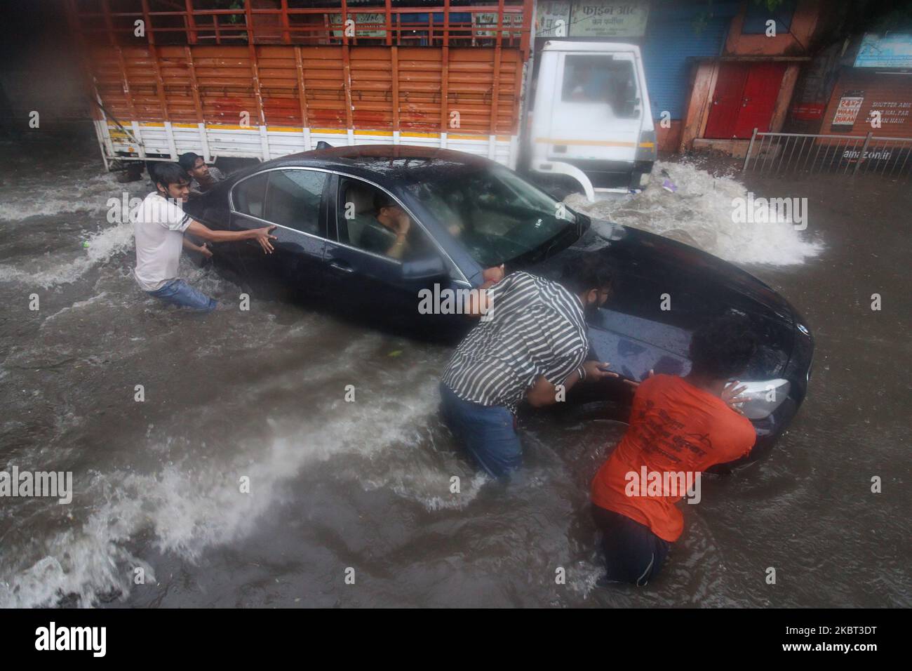 Push car in flood hi-res stock photography and images - Alamy
