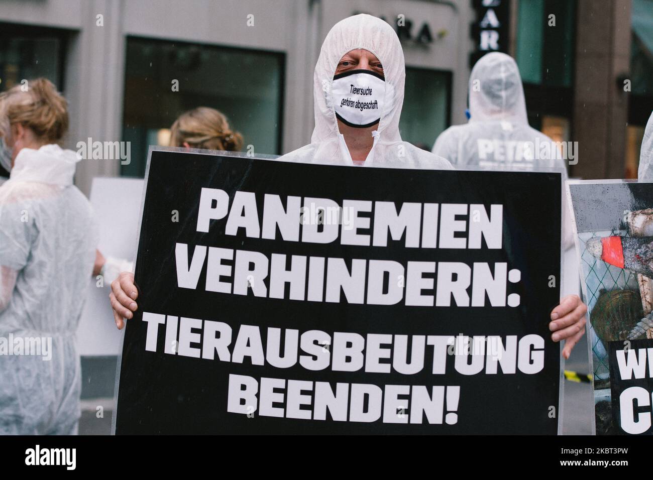 the placard is seen " Pandemic prevention: exploitation of animal ...