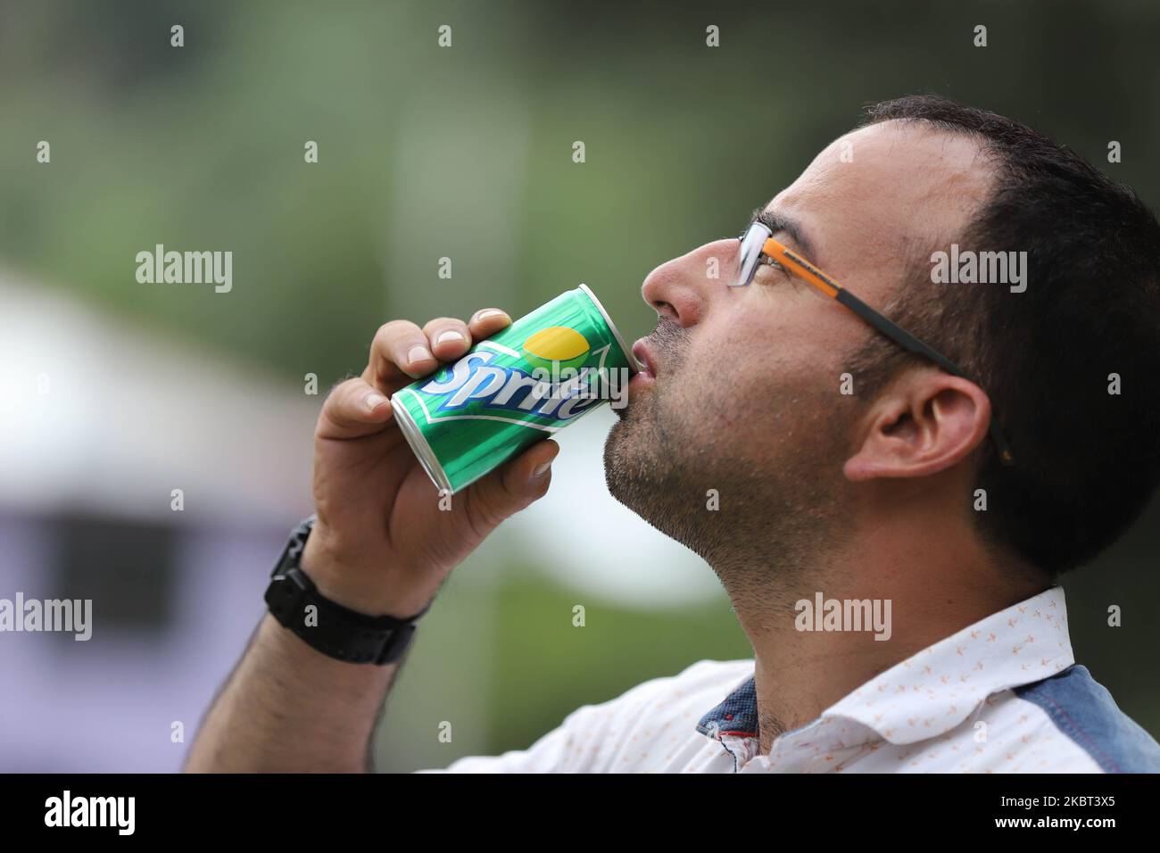 Man drinks sprite drink hi-res stock photography and images - Alamy