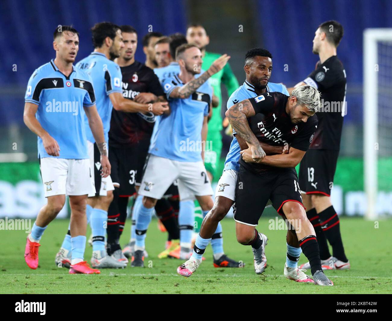 Manuel Lazzari, Marco Parolo and Gil Patric of Lazio arguing with Theo ...