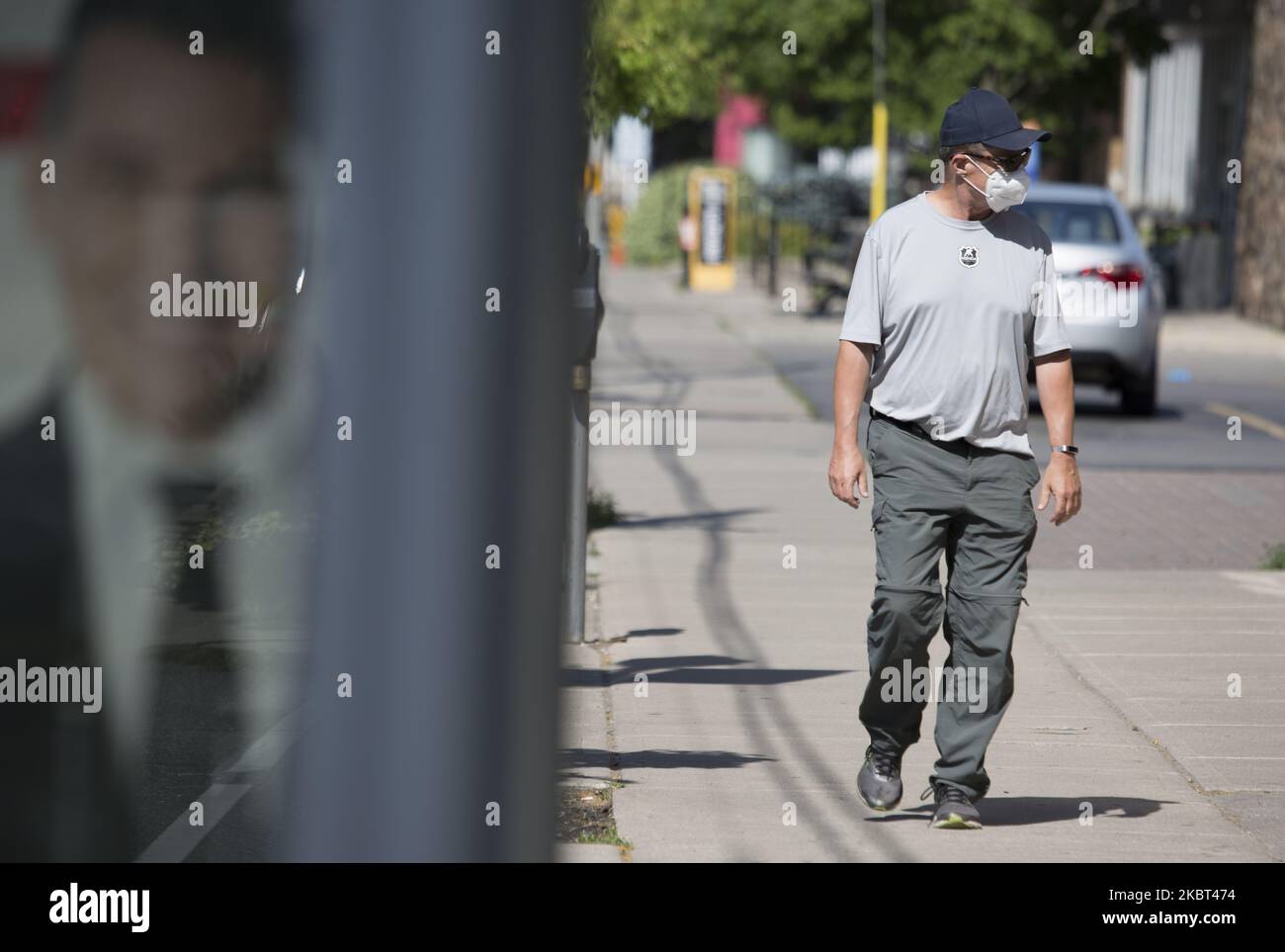 People wearing face masks to protect them from the COVID-19 in Hamilton ...