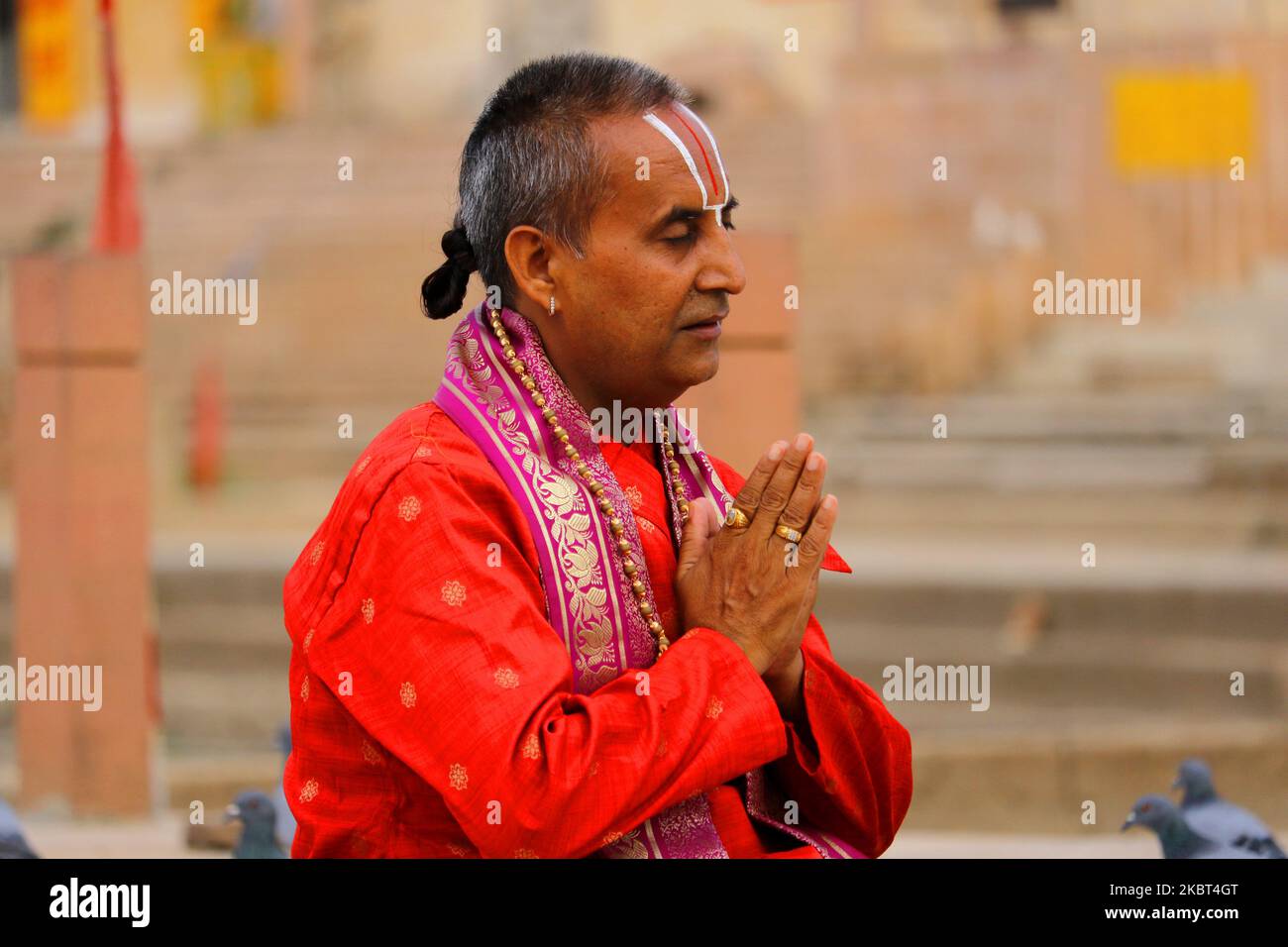 Indian hindu priest offers prayers on the occasion of ''Guru Purnima ...