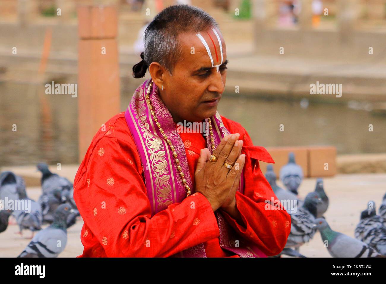 Indian hindu priest offers prayers on the occasion of ''Guru Purnima ...