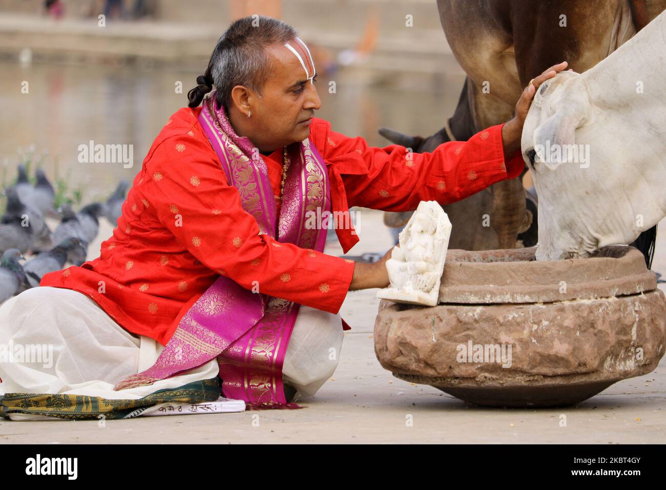 Indian hindu priest offers prayers on the occasion of ''Guru Purnima ...