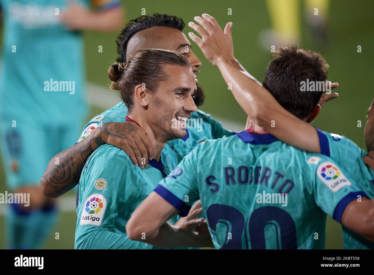 Antoine Griezmann of Barcelona celebrates after scoring his sides first ...