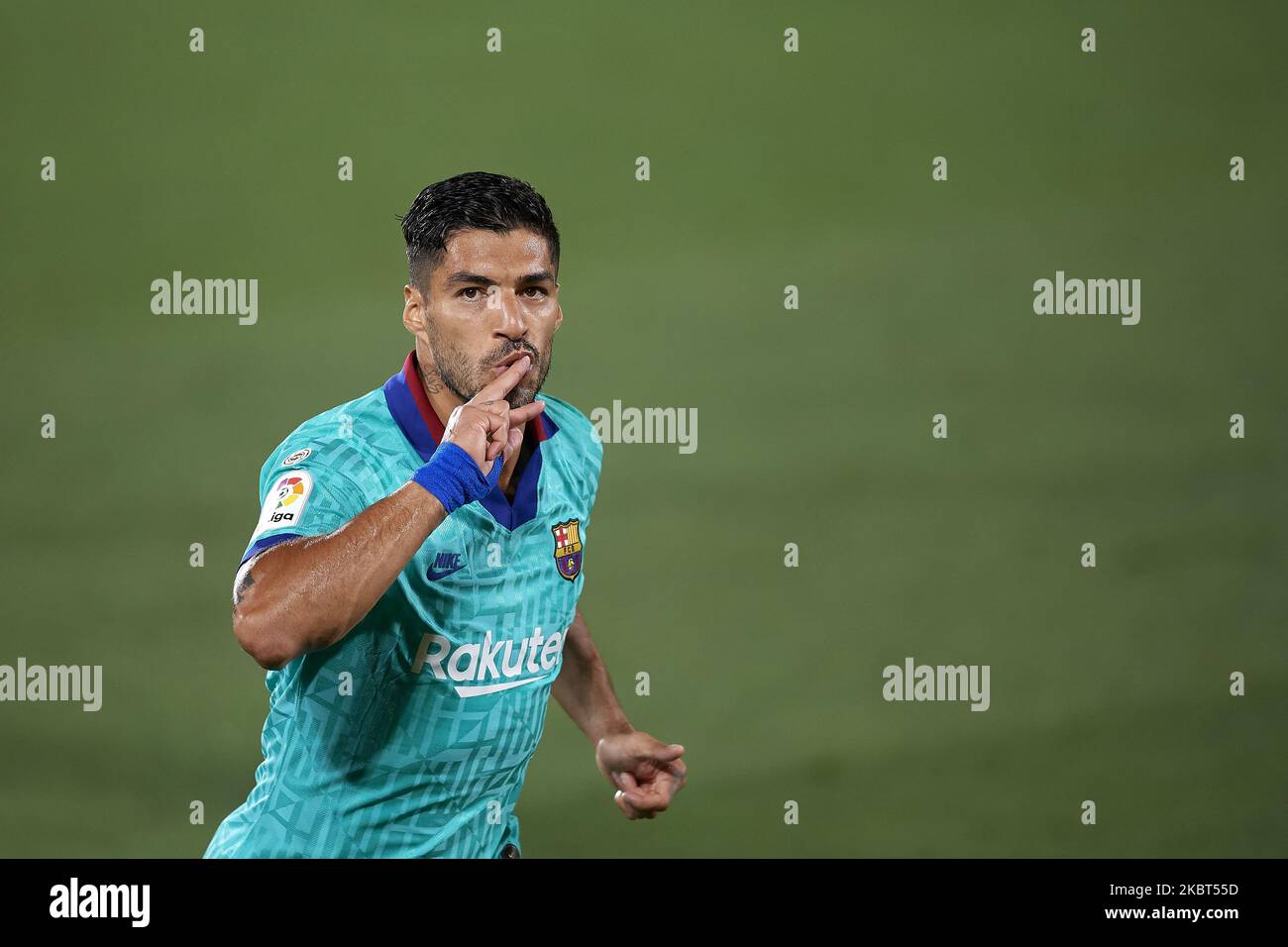 Luis Suarez of Barcelona celebrates after scoring his sides first goal ...