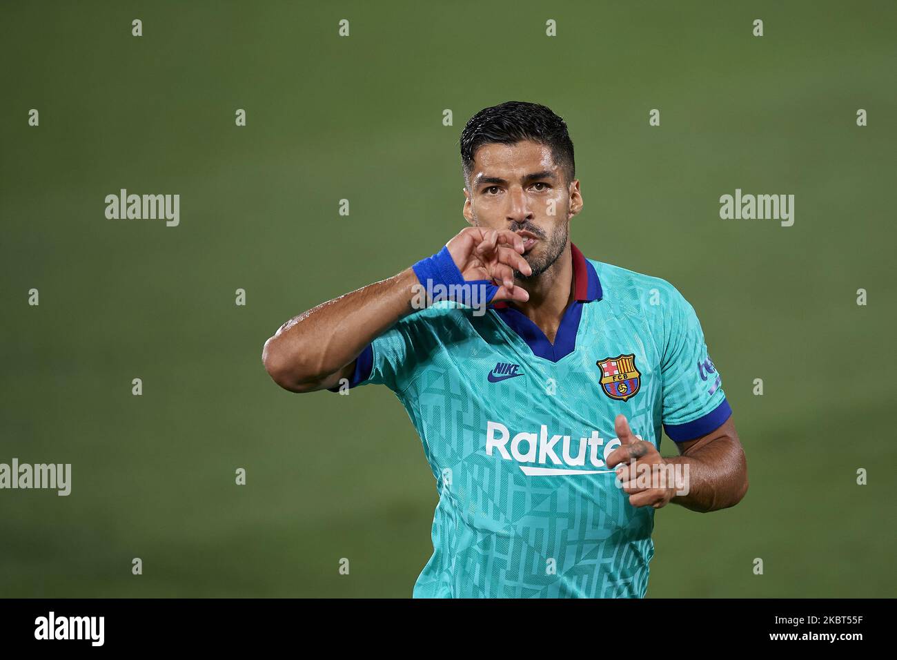 Luis Suarez of Barcelona celebrates after scoring his sides first goal ...