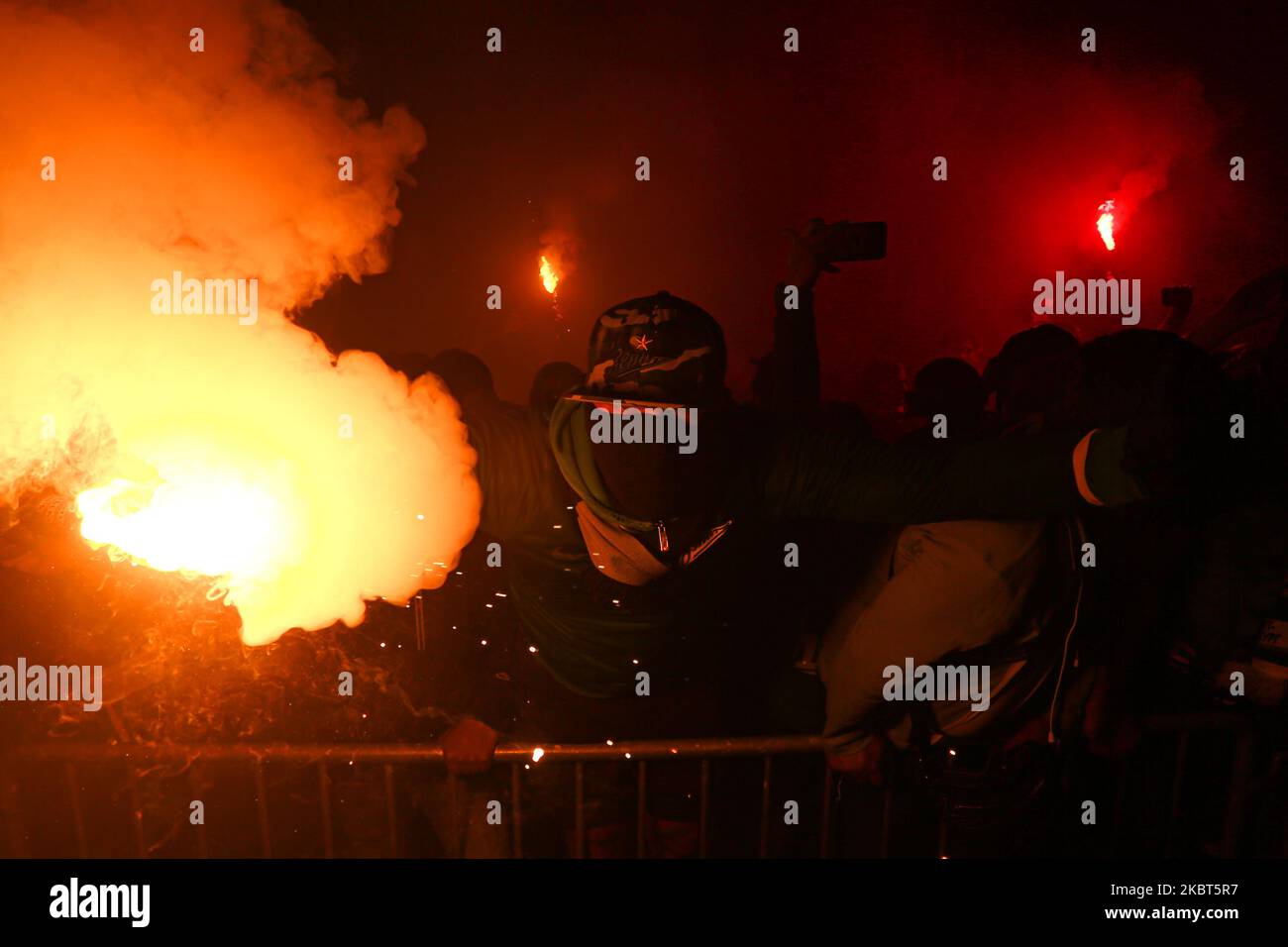Fans of the Zenit team at Pulkovo Airport meet the team after arriving ...