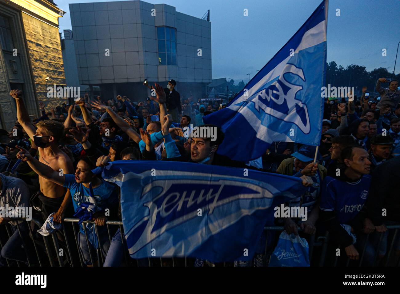 Fans of the Zenit team at Pulkovo Airport meet the team after arriving ...