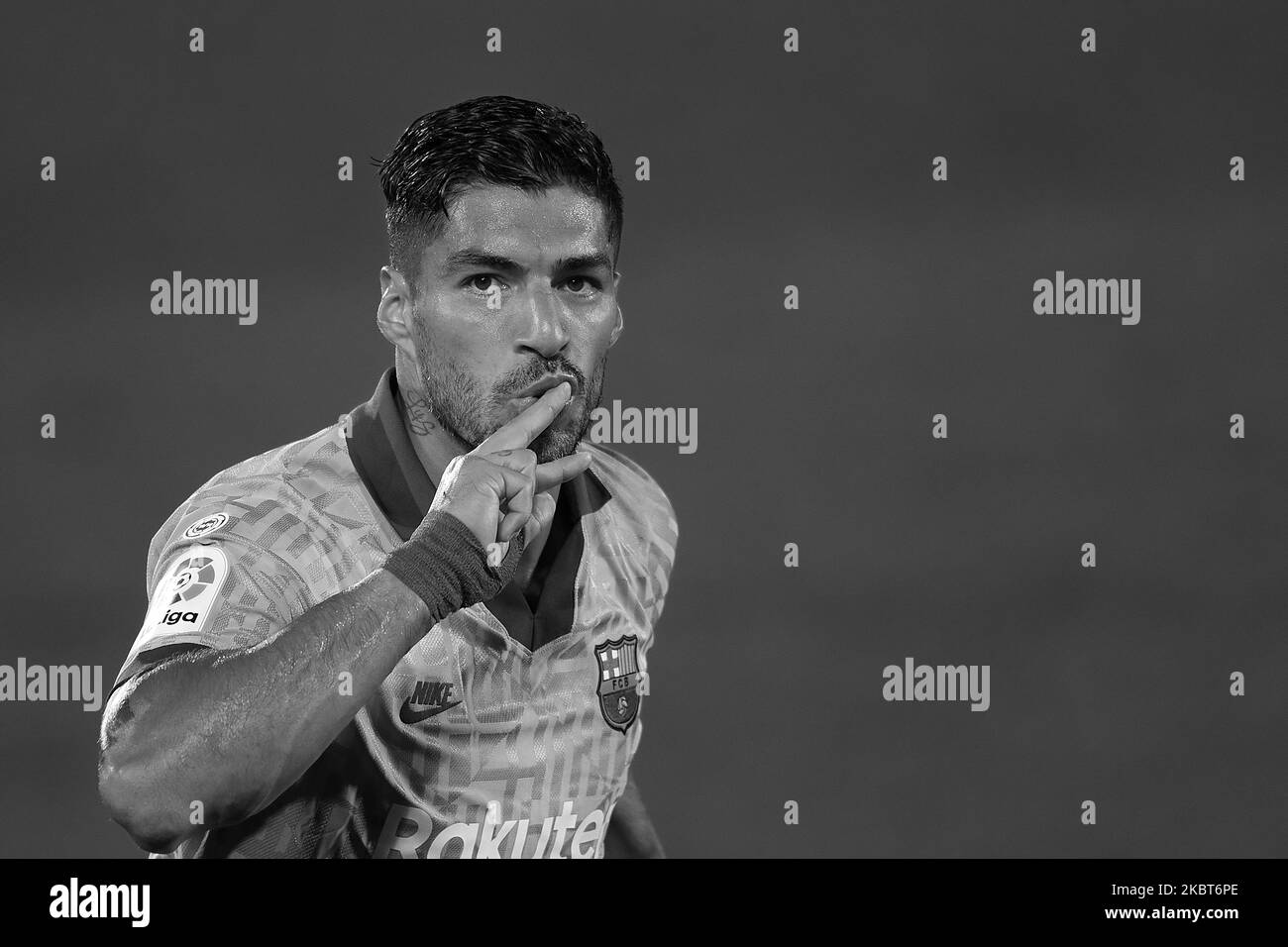 Luis Suarez of Barcelona celebrates kissing the his fingers after ...