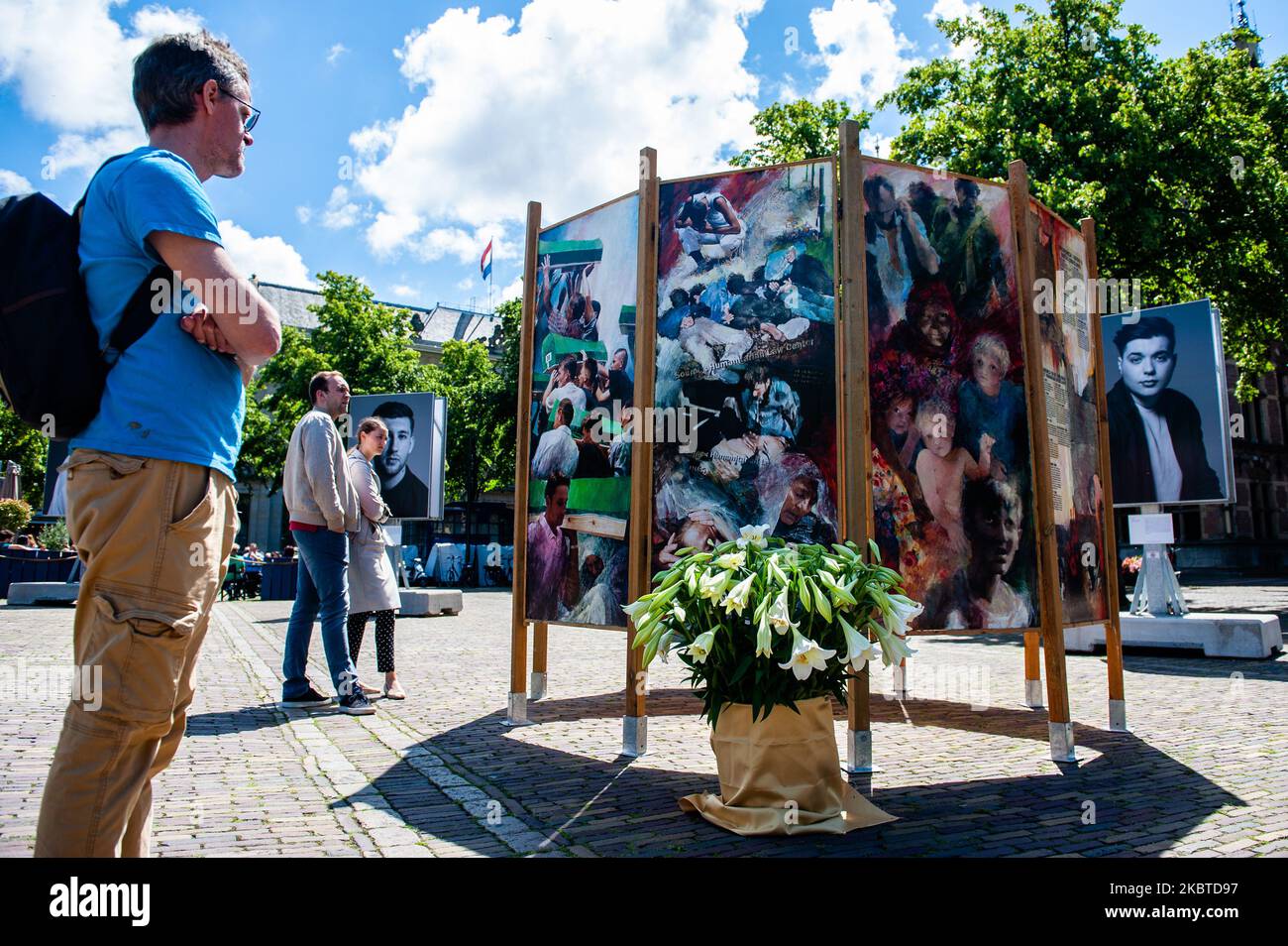 A man is looking at a monument in memory of the Srebrenica genocide ...