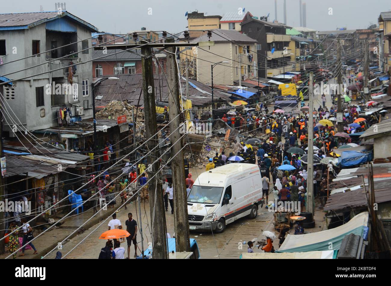 Over view the collapsed building as men of the Lagos State Emergency ...