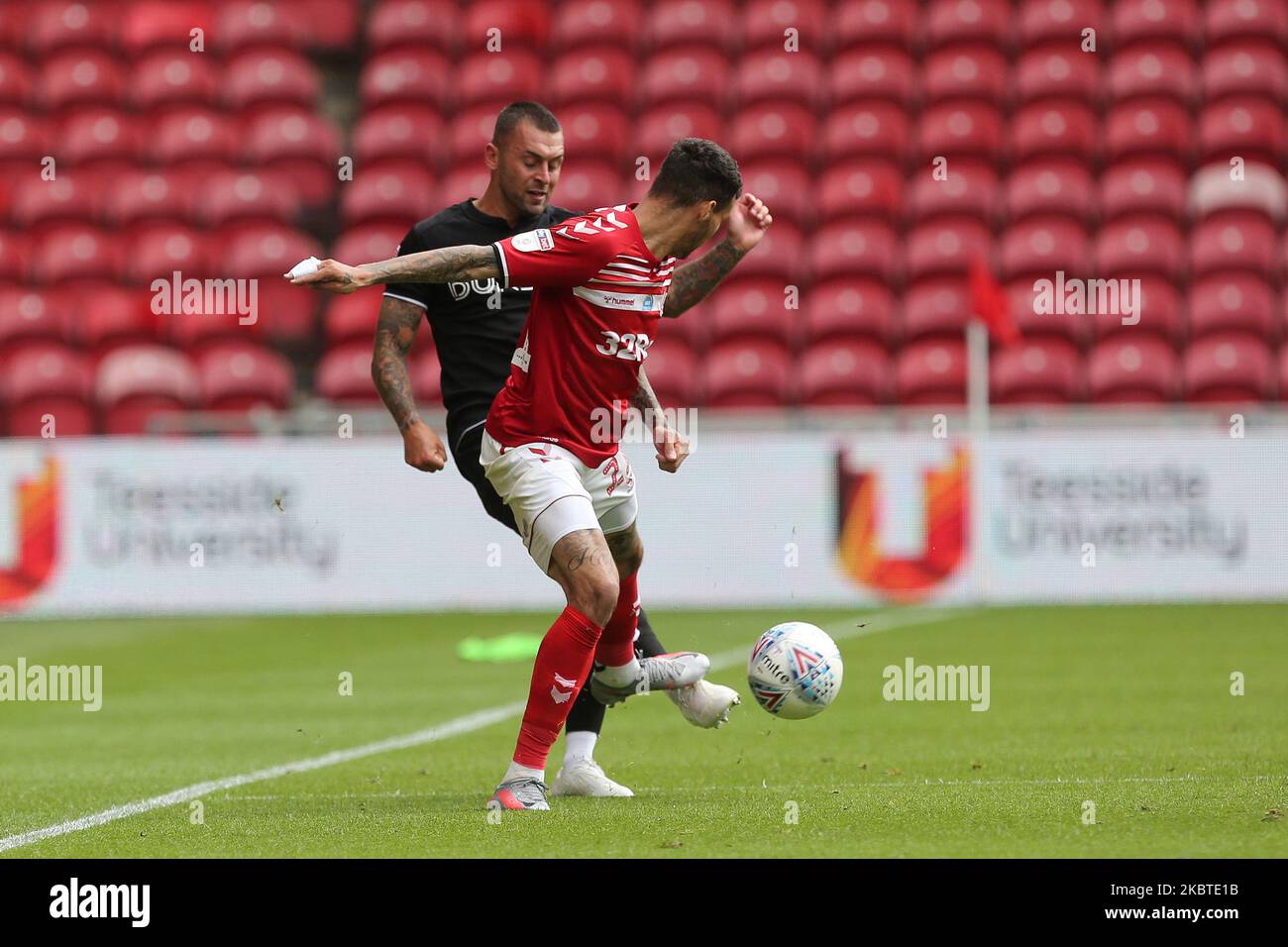 Jack Hunt of Bristol City in action with Middlesbrough's Ravel Morrison ...