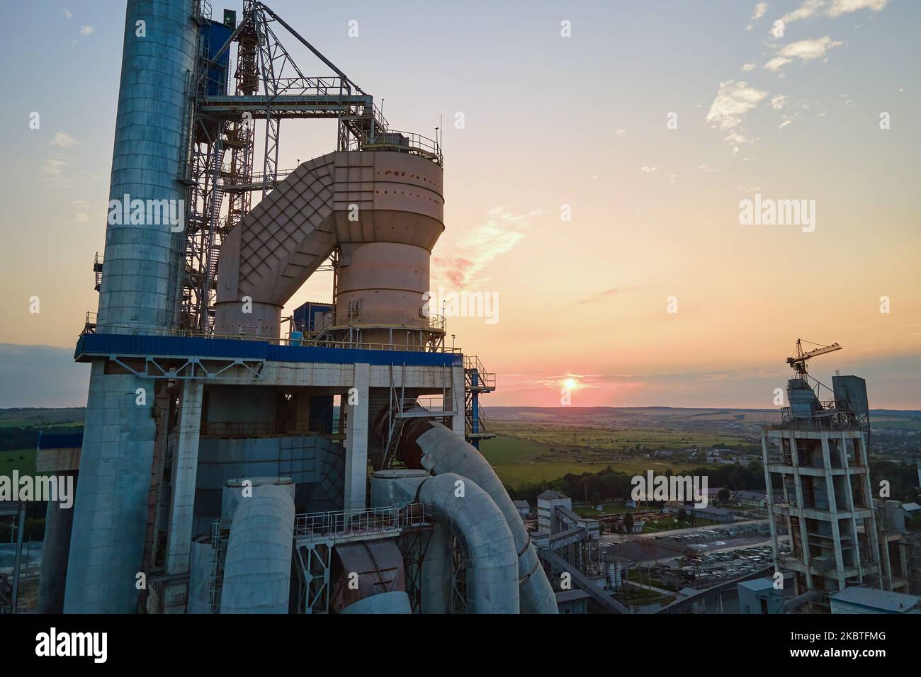 Aerial view of cement factory with high concrete plant structure and ...