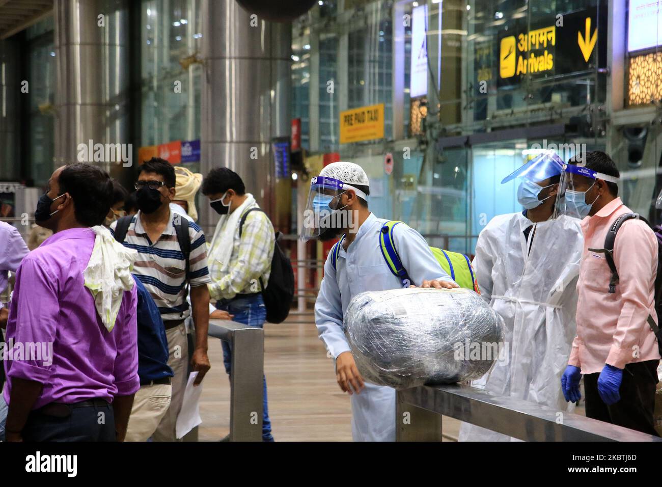 Indian migrants board hi-res stock photography and images - Alamy