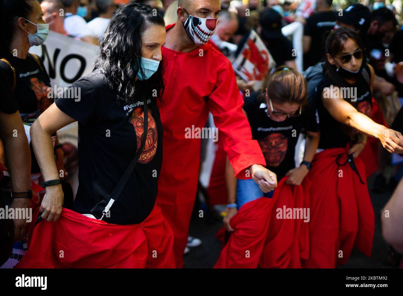 Nissan workers disguise themselves in the suit of the Spanish series ...