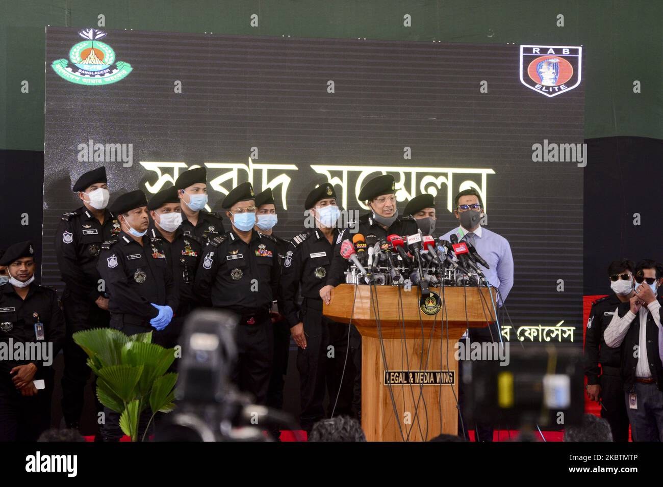 Officers of Rapid Action Battalion (RAB) attend a press conference at ...