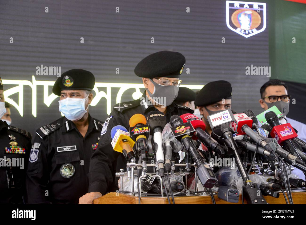 Officers of Rapid Action Battalion (RAB) attend a press conference at ...