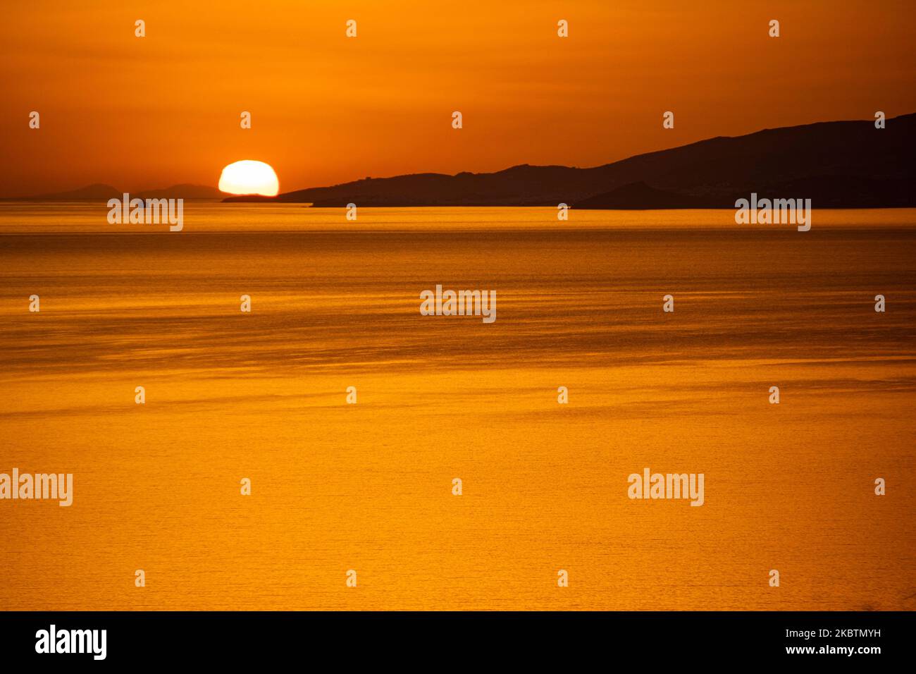 Dreamy sunset during the golden hour before dusk with the sky shifting ...